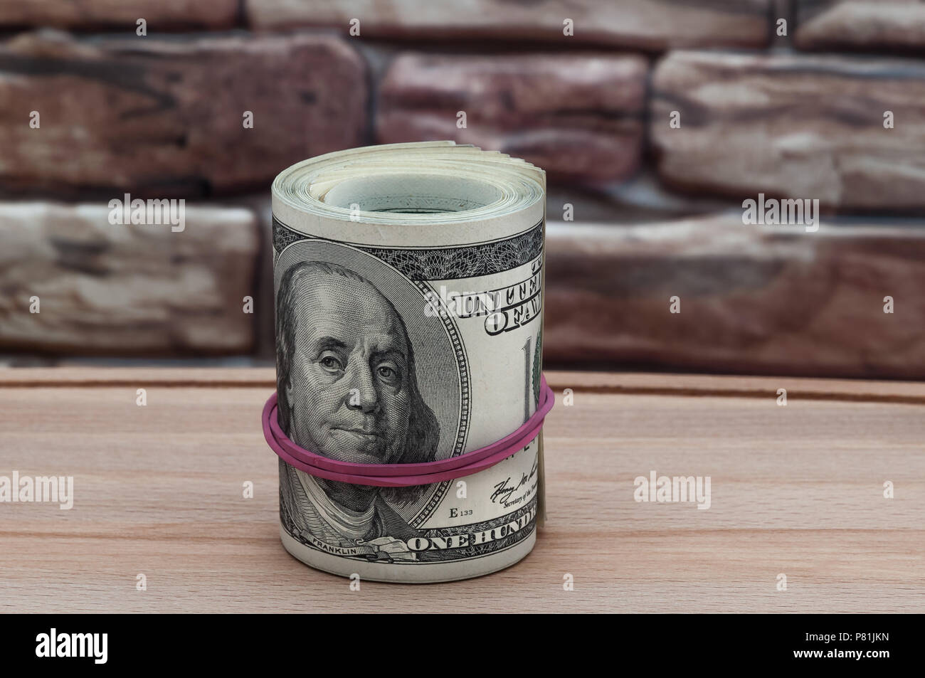 A bundle of two thousand dollars in bills of one hundred American ...