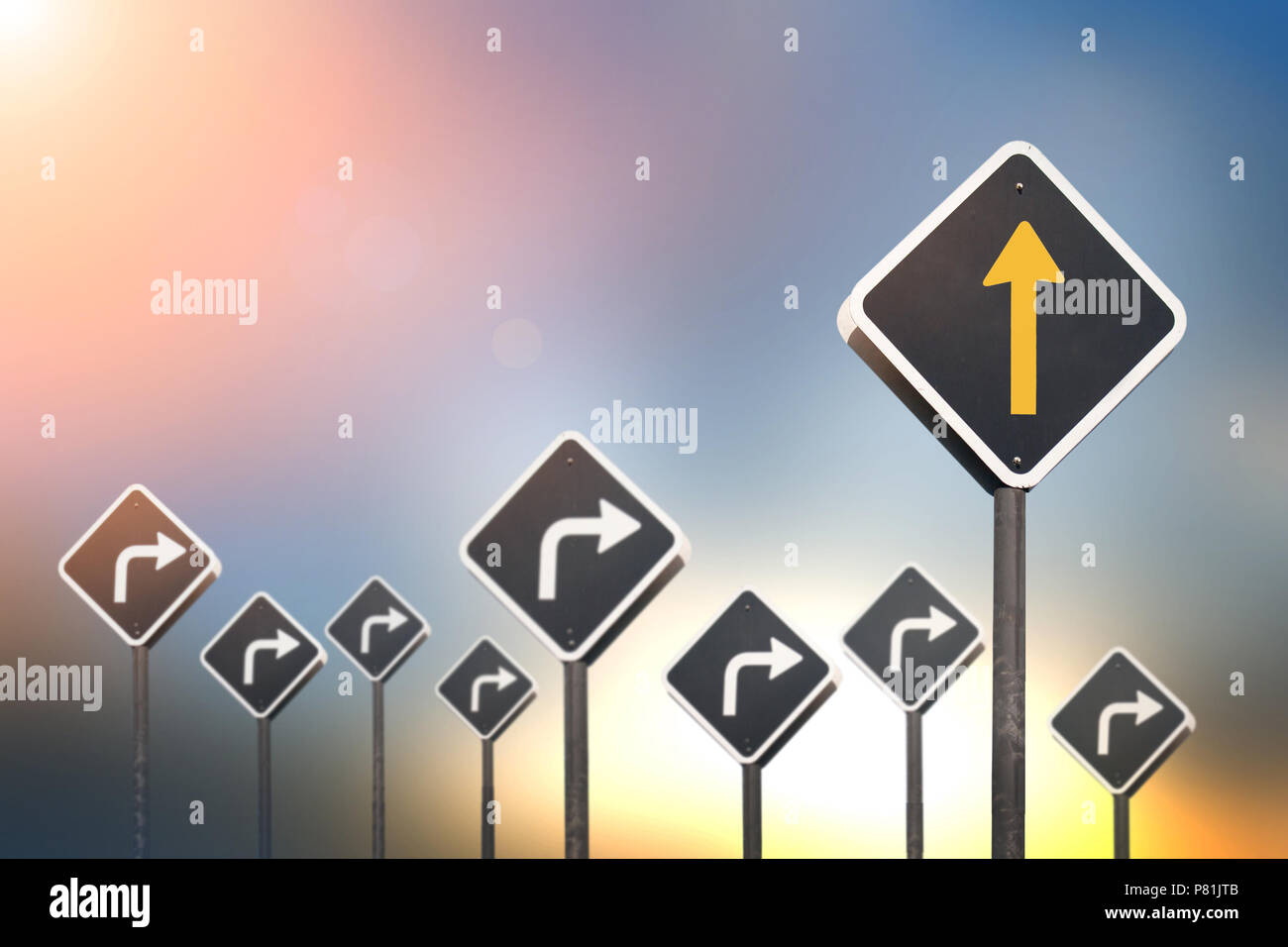 Different way concept by go straight yellow arrow traffic sign and many ...