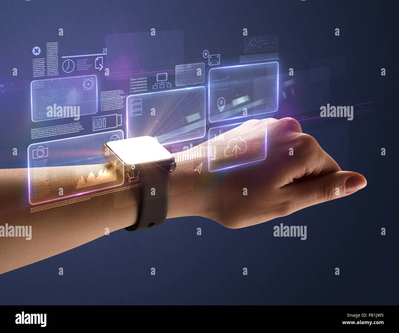 Female hand wearing smartwatch with statement labels around and dark ...