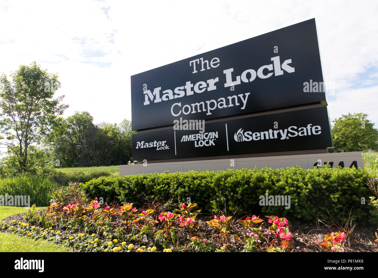 A logo sign outside of the headquarters of Master Lock in Oak Creek ...