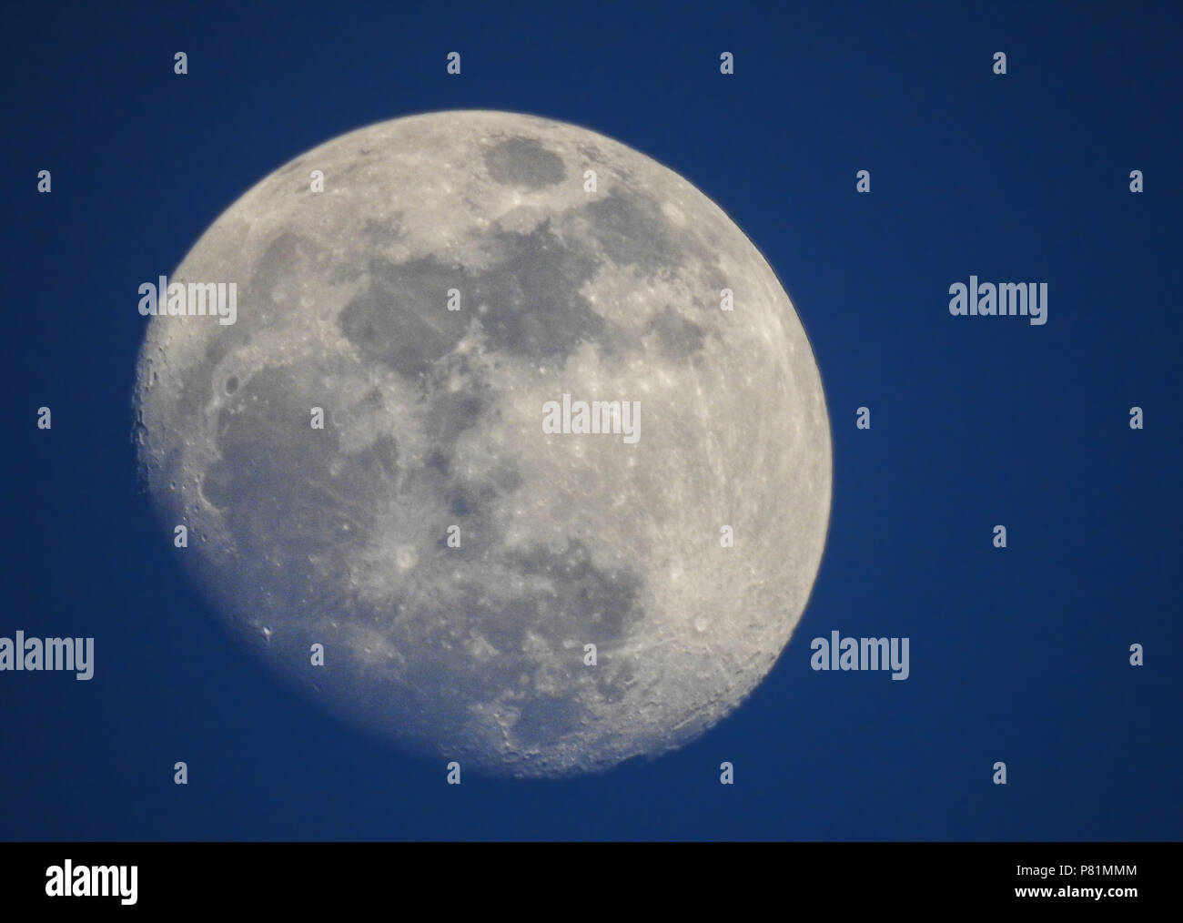 Phase of the white moon in daytime Stock Photo - Alamy