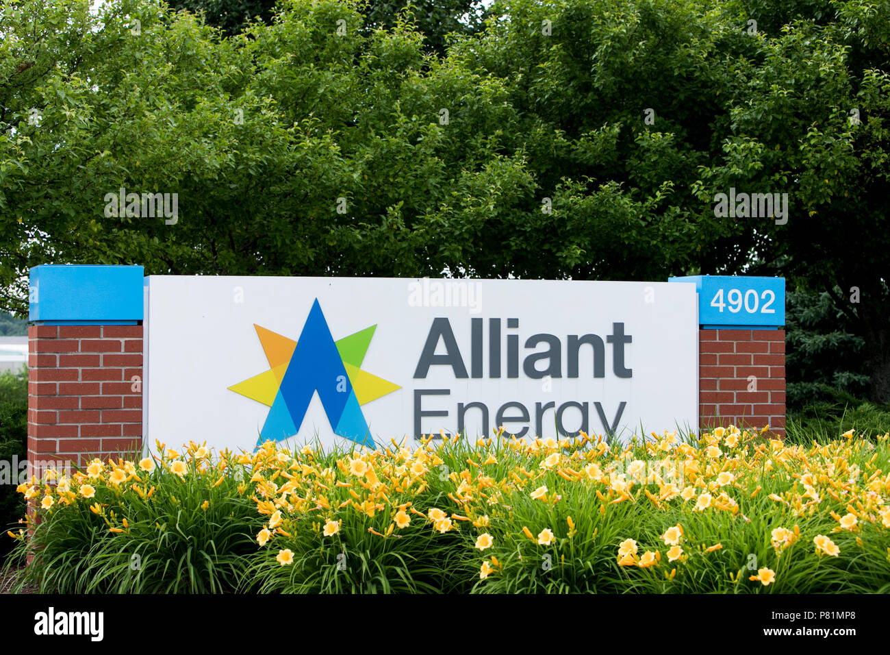 A logo sign outside of the headquarters of Alliant Energy in Madison ...