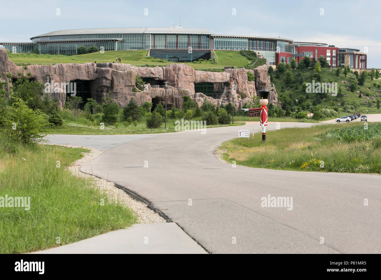 A logo sign outside of the headquarters of the Epic Systems Corporation ...