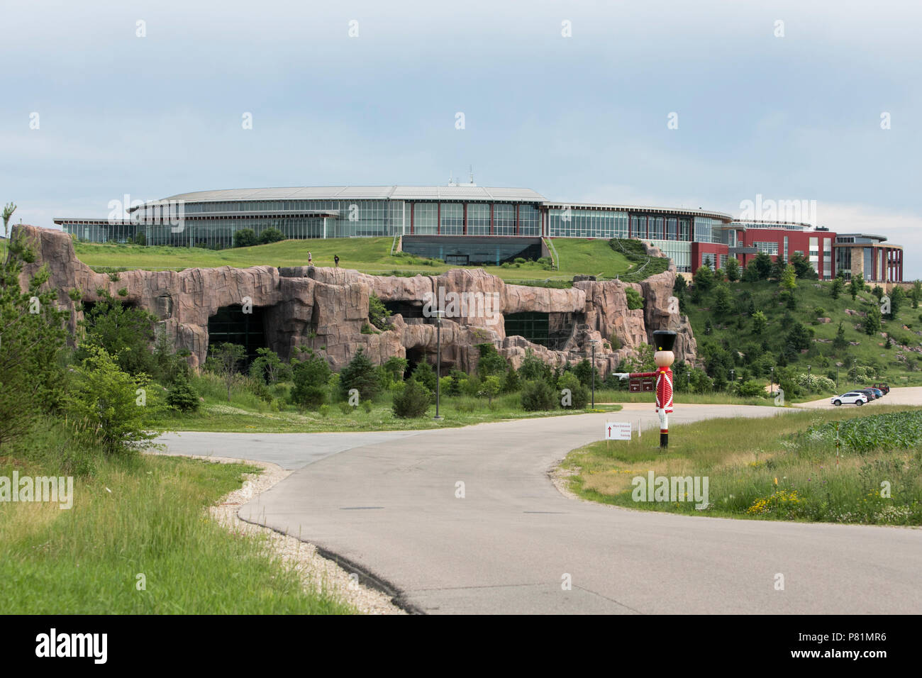 A logo sign outside of the headquarters of the Epic Systems Corporation ...