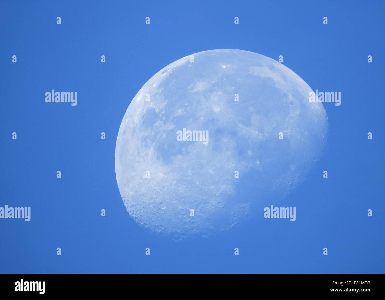 Phase of the white moon in daytime Stock Photo - Alamy