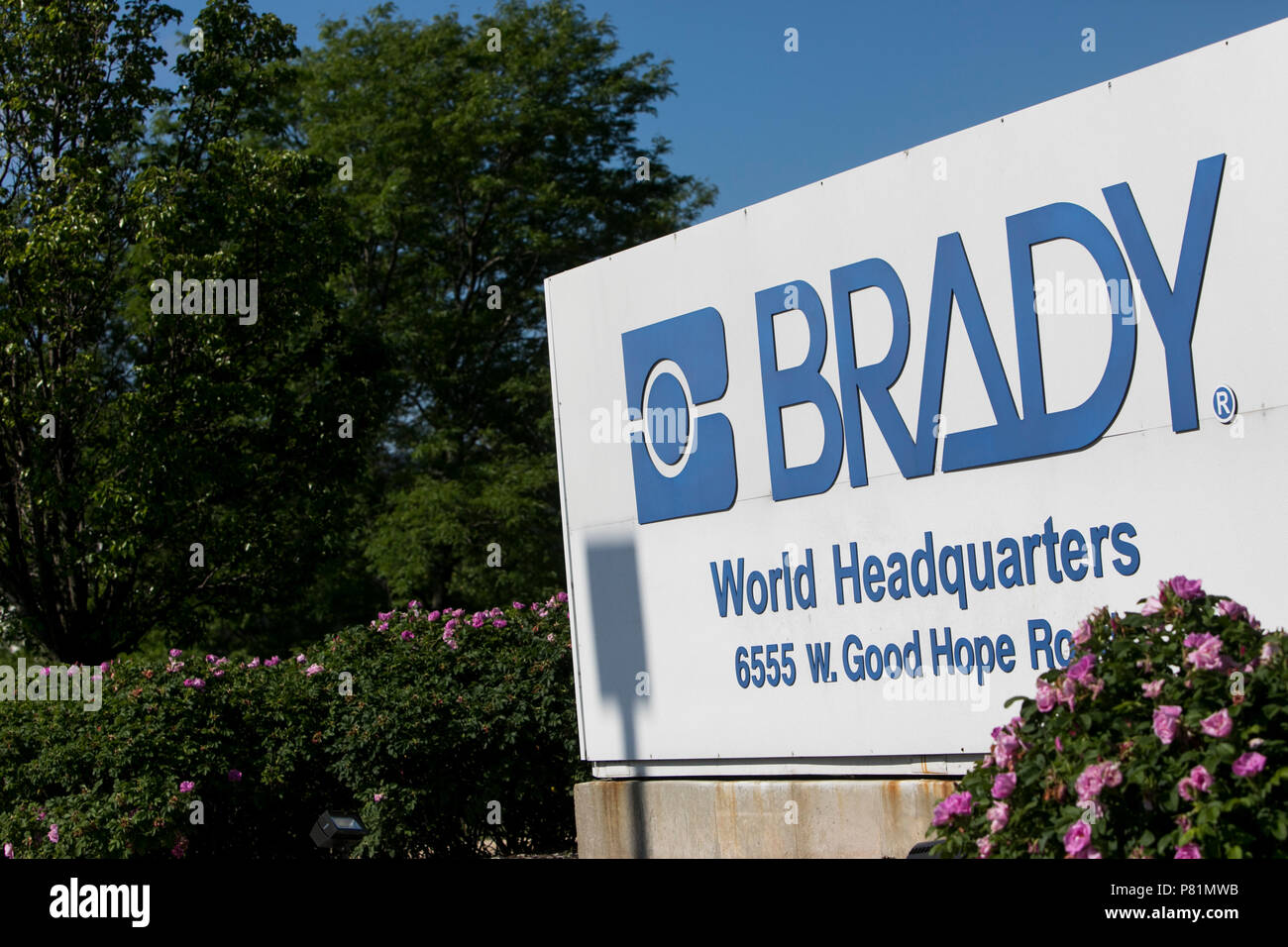 A logo sign outside of the headquarters of the Brady Corporation in ...