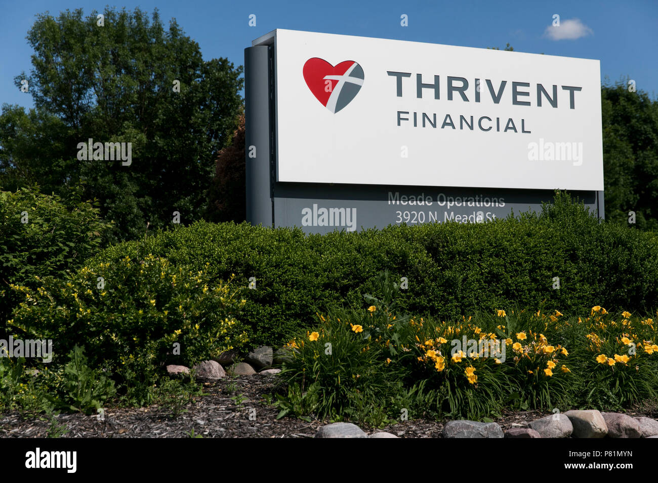A logo sign outside of the headquarters of Thrivent Financial in ...