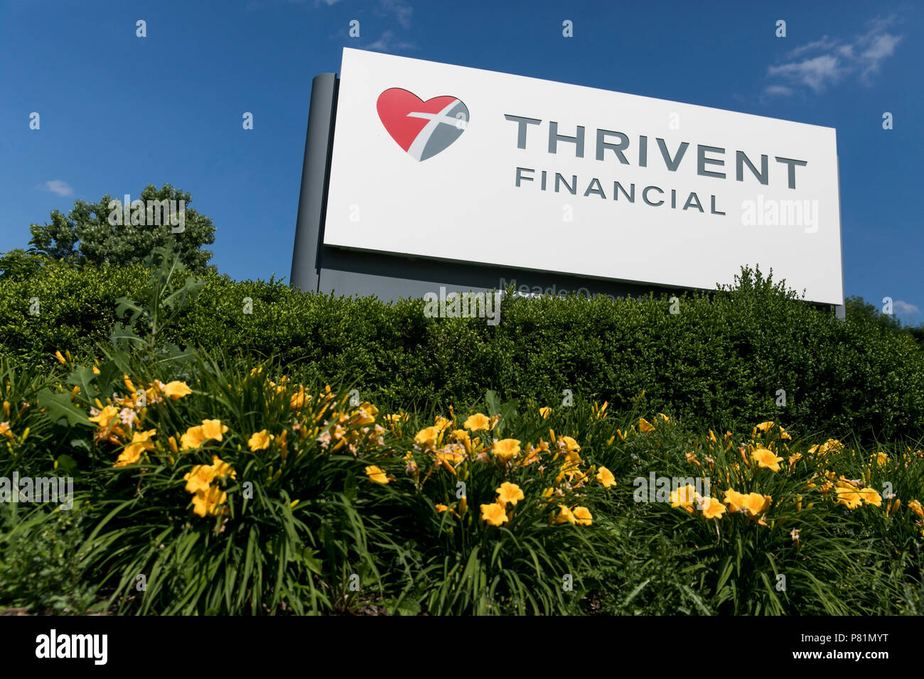 A logo sign outside of the headquarters of Thrivent Financial in ...