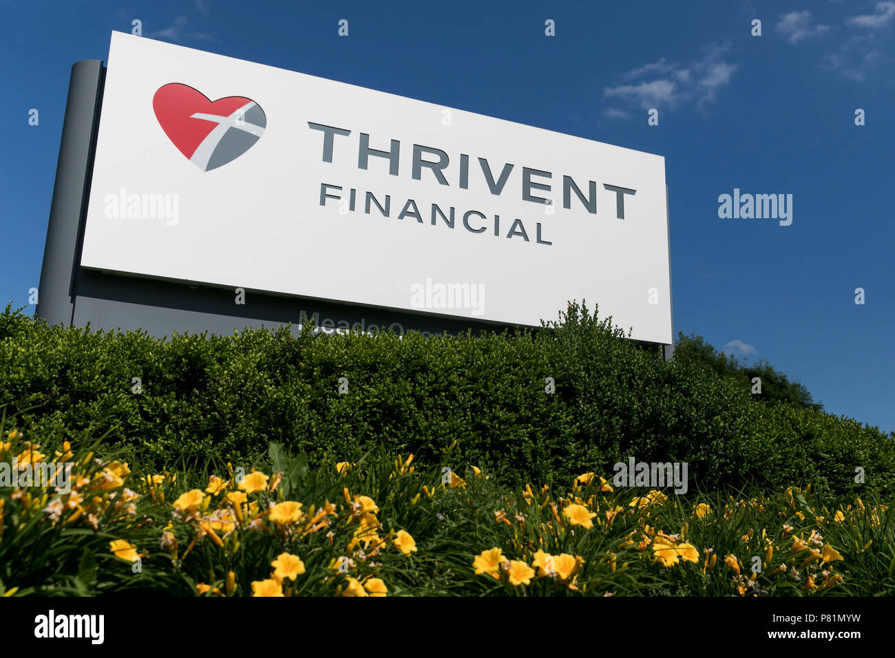 A logo sign outside of the headquarters of Thrivent Financial in ...