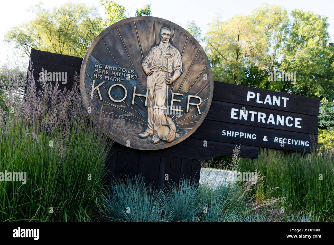 A logo sign outside of the headquarters of Kohler Co., in Kohler ...