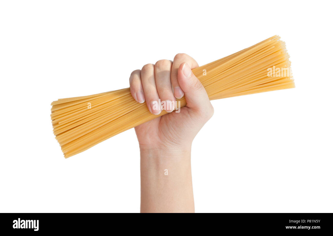 Bunch of spaghetti in asian female hand Stock Photo - Alamy