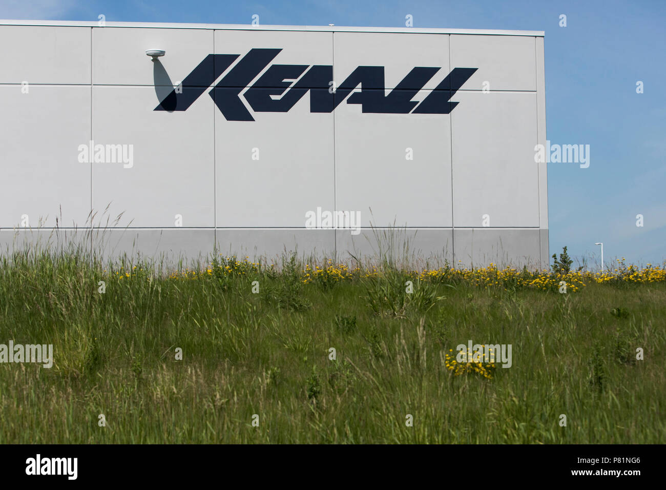 A logo sign outside of a facility occupied by Kenall Manufacturing in ...