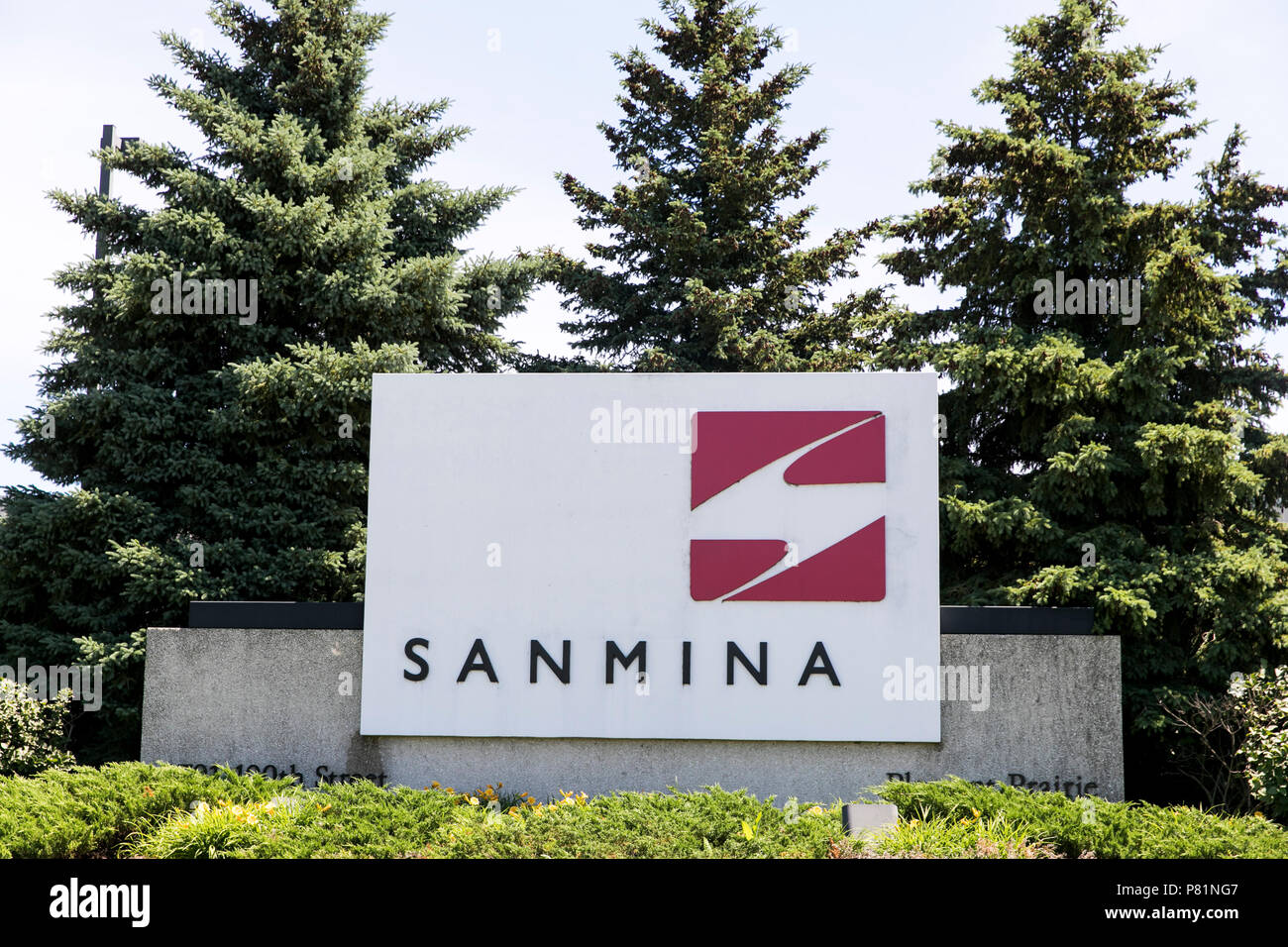 A logo sign outside of a facility occupied by the Sanmina Corporation ...