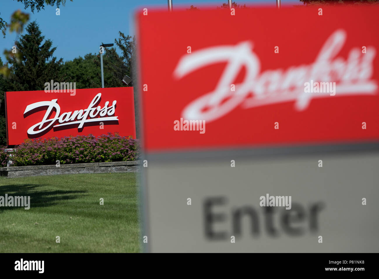 A logo sign outside of a facility occupied by The Danfoss Group in ...