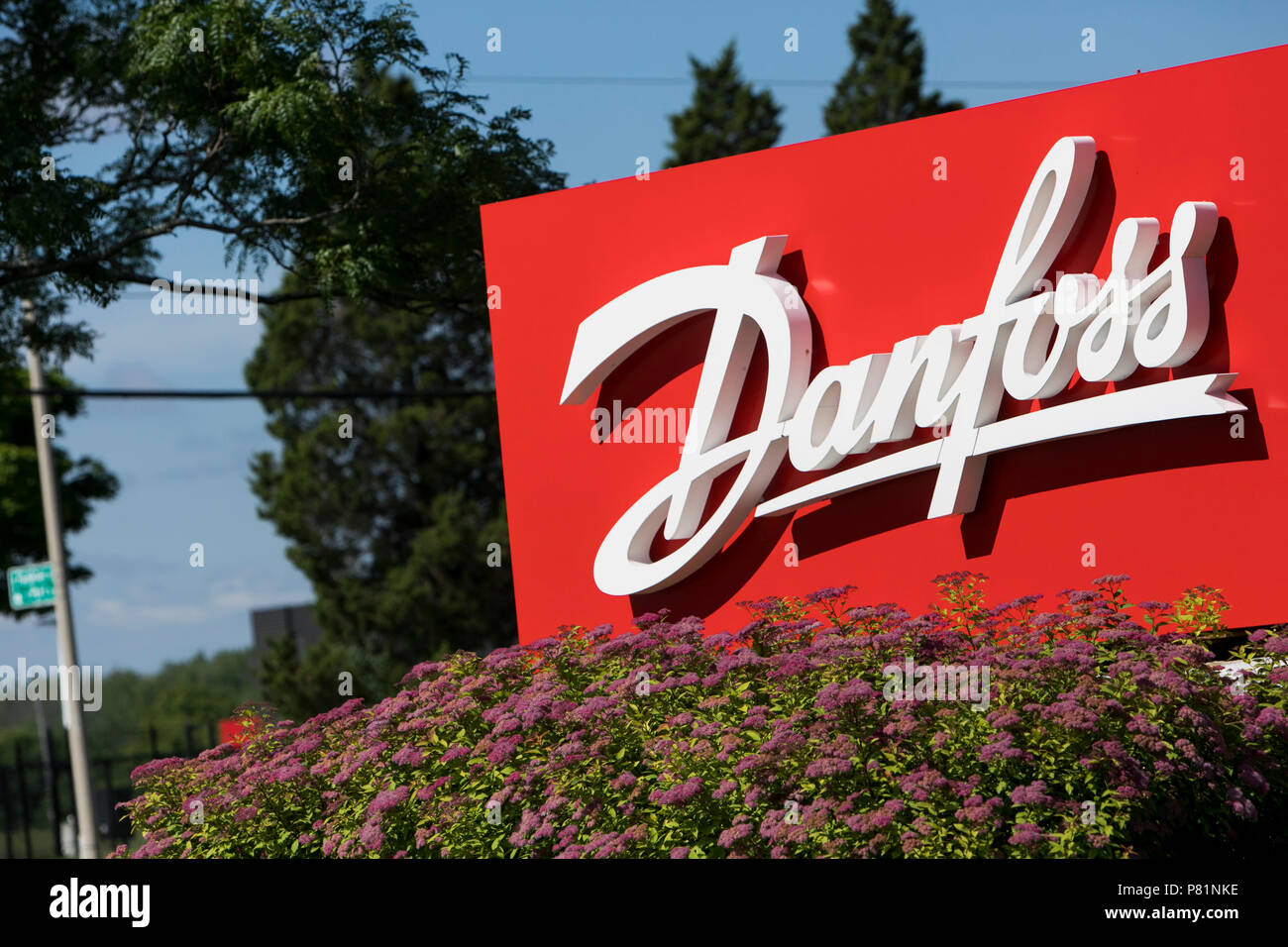 A logo sign outside of a facility occupied by The Danfoss Group in ...