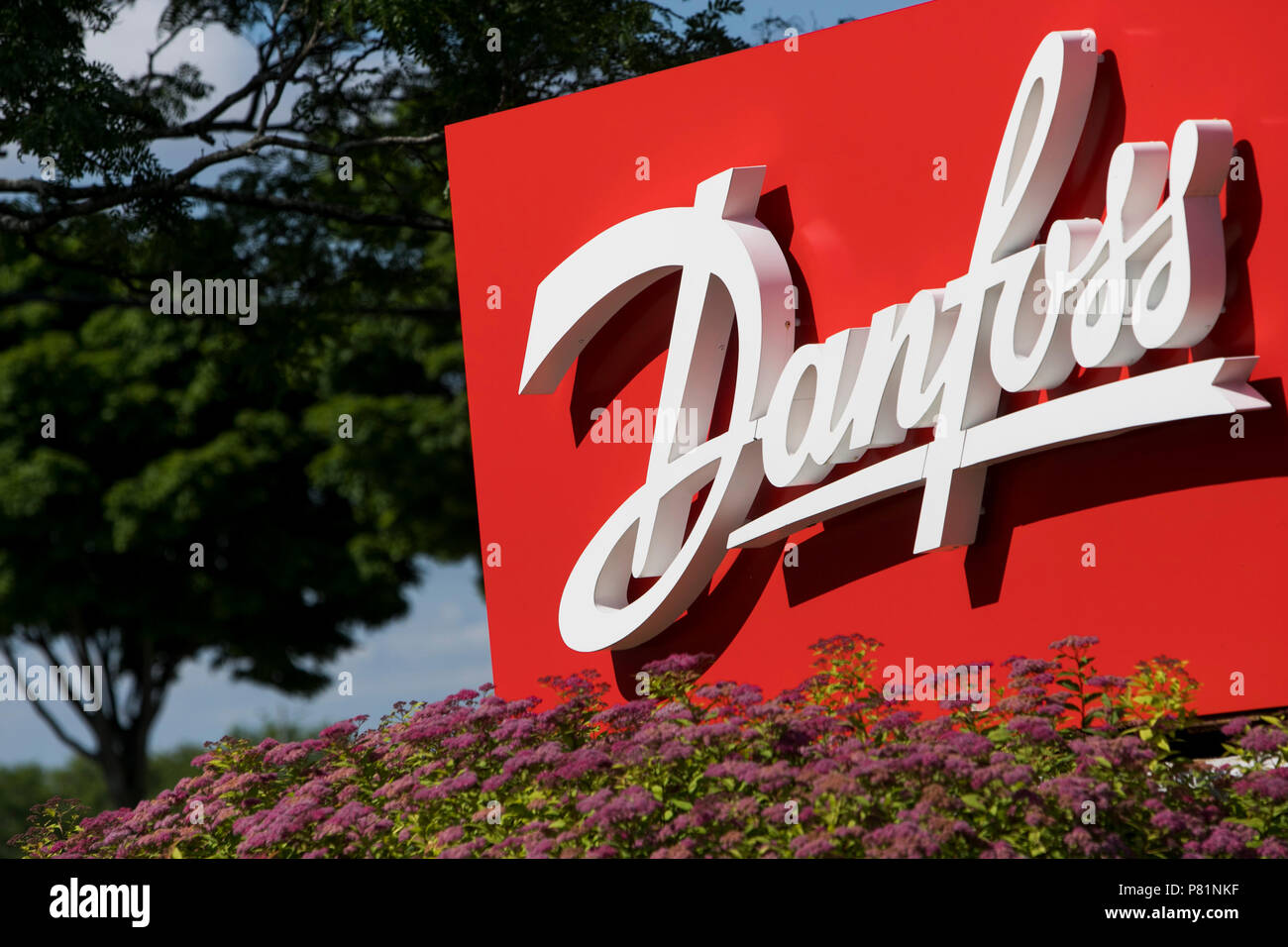 A logo sign outside of a facility occupied by The Danfoss Group in ...
