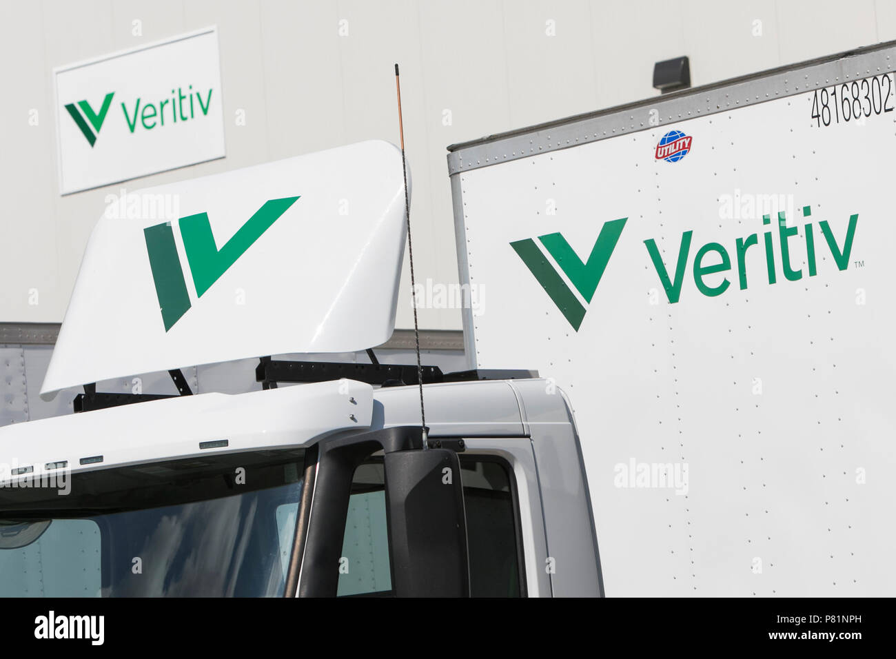 Semi-trucks and trailers featuring Veritiv Corporation logos outside of ...
