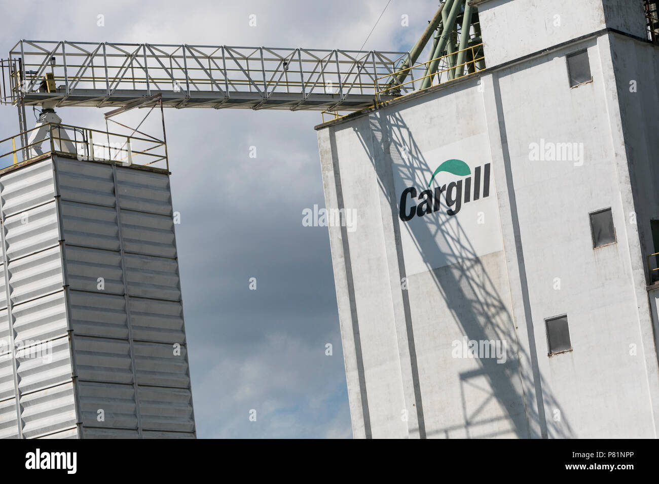 A logo sign outside of a facility occupied by Cargill Animal Nutrition ...