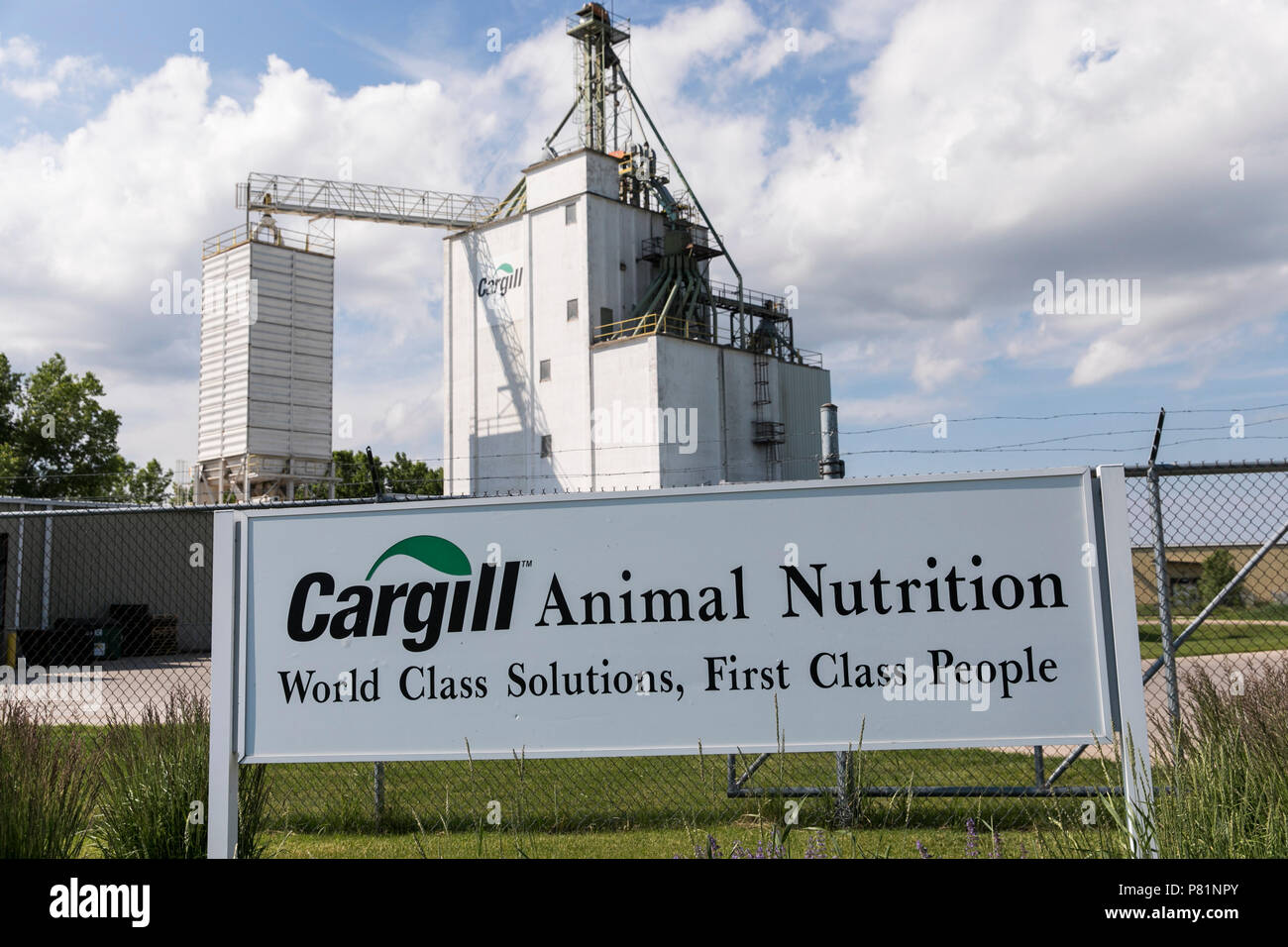 A logo sign outside of a facility occupied by Cargill Animal Nutrition ...