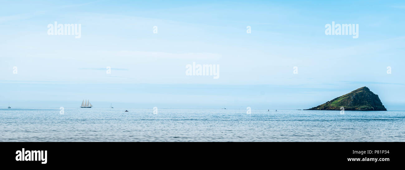 The Great Mewstone rock off the coast of Wembury beach in Devon Stock ...