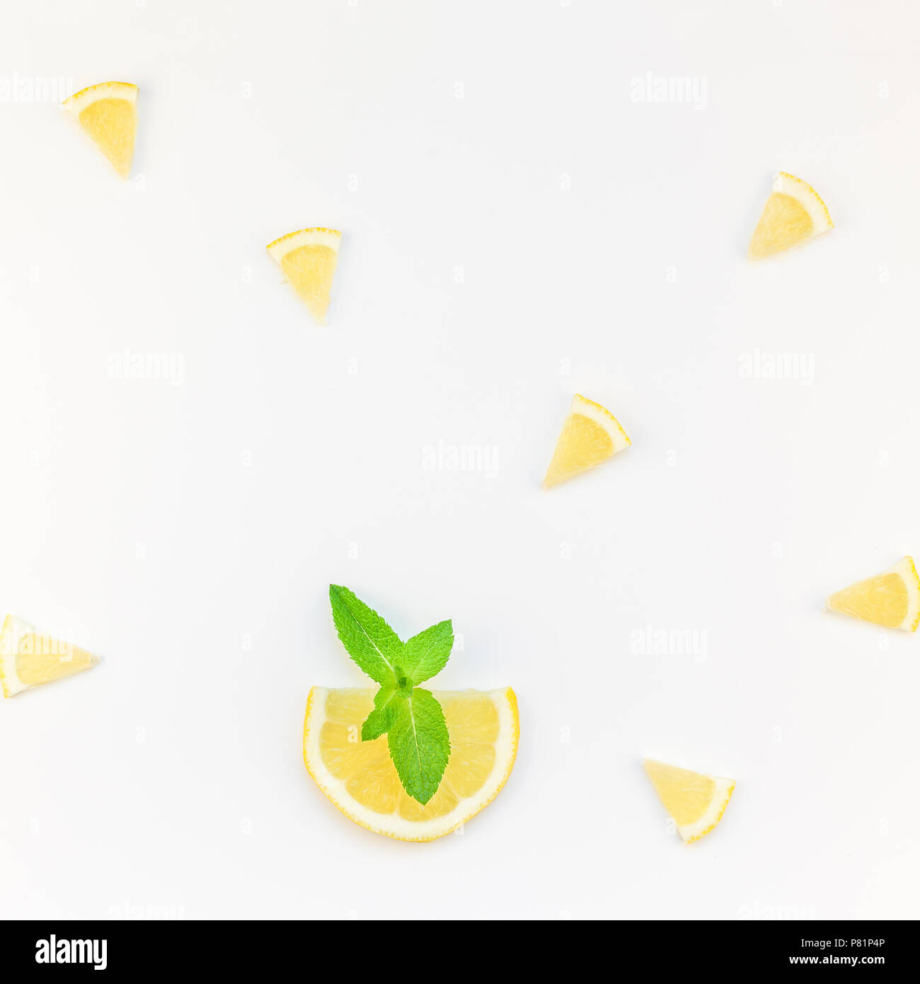 Square flatlay overhead top view citrus lemon slices and mint herbs ...