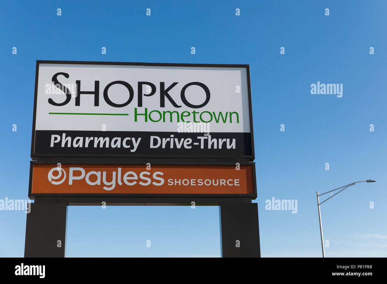 A logo sign outside of a Shopko Hometown retail store in Kiel ...