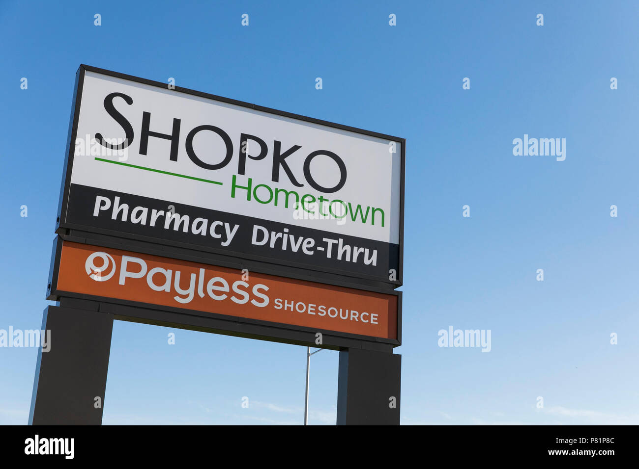 A logo sign outside of a Shopko Hometown retail store in Kiel ...