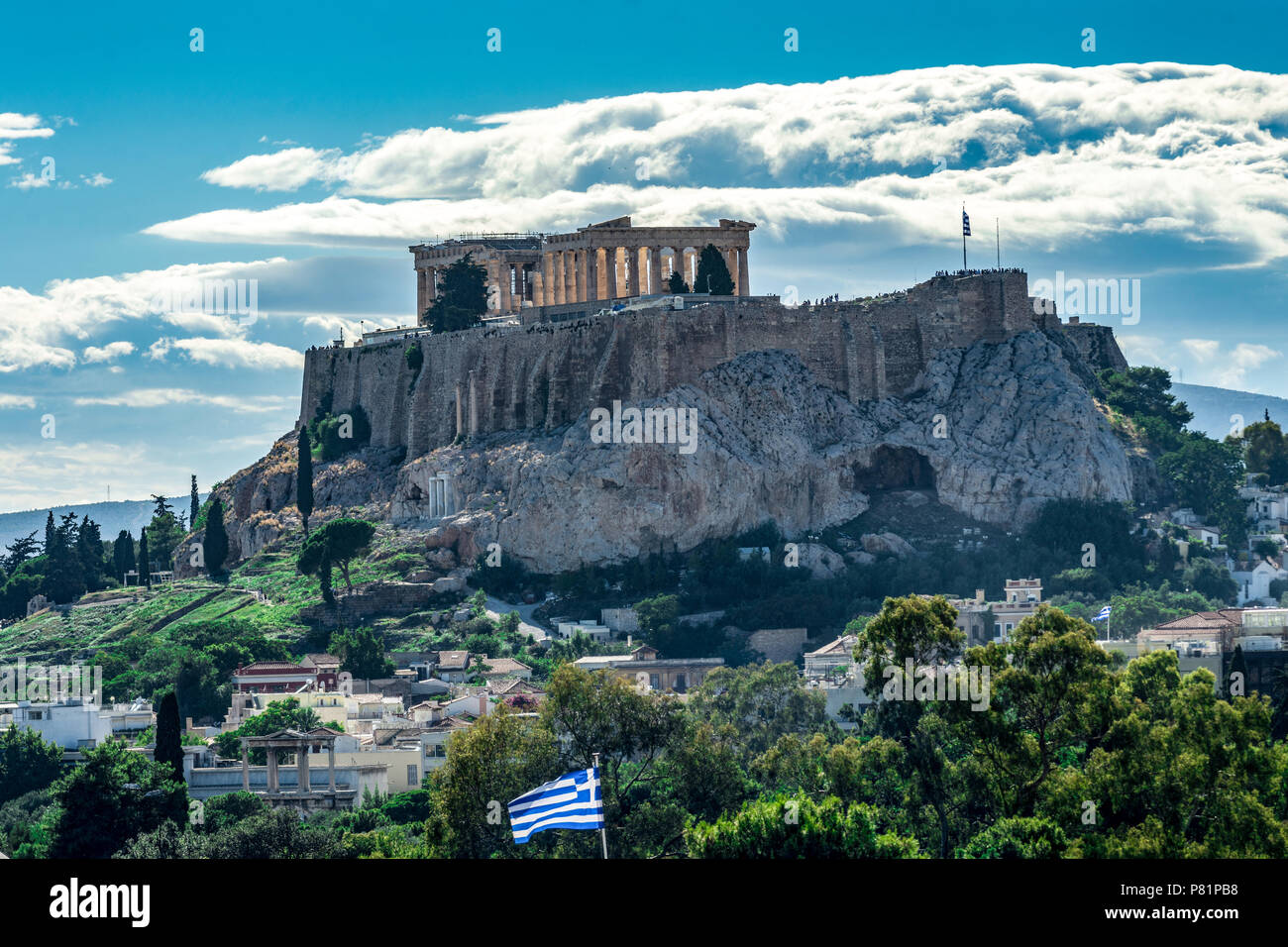 Acropolis view from behind, with clouds in the sky, Athens, Greece ...