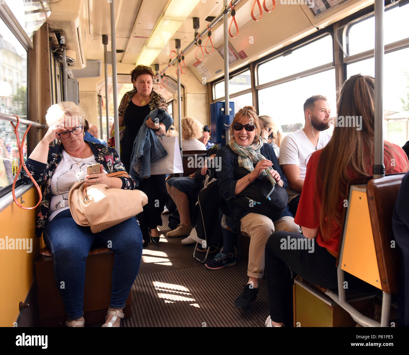 Vienna in Austria passengers on public trams transport system Europe ...