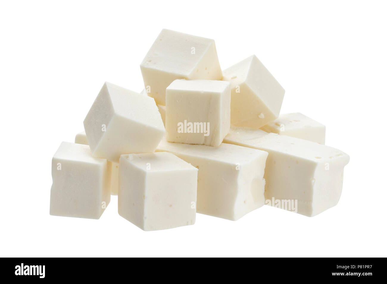 Heap of diced feta cubes isolated on white background Stock Photo - Alamy