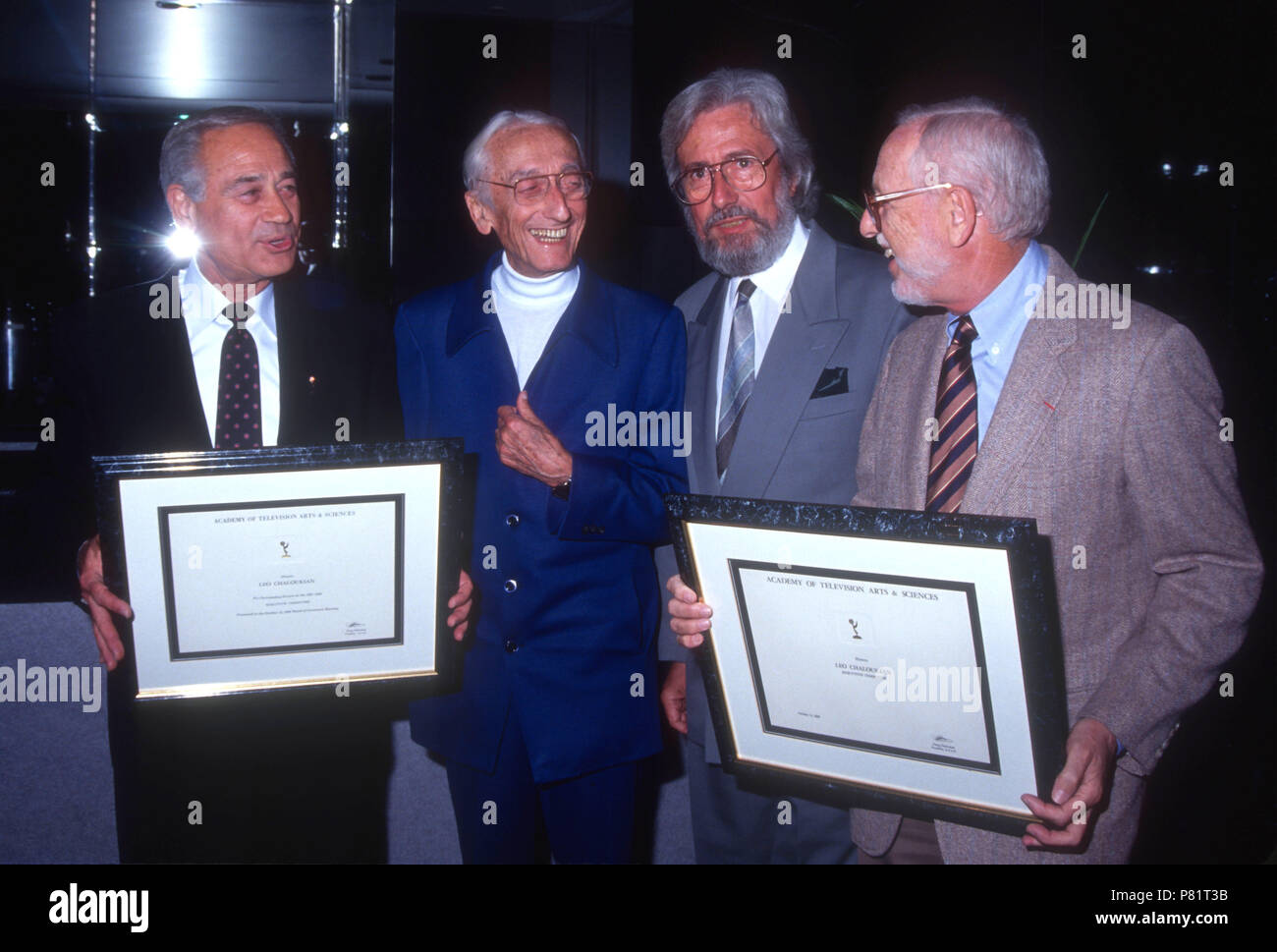 BEVERLY HILLS, CA - JANUARY 28: (L-R) Guest, French explorer ...