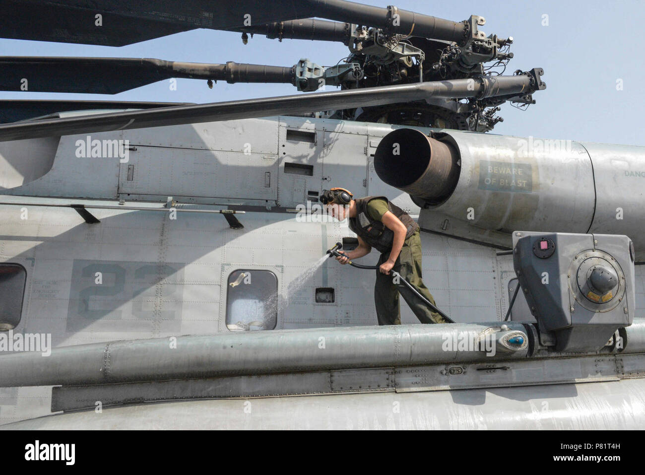 GULF OF ADEN (Aug. 20, 2016) Marine Cpl. Johnathan Mecklin washes a CH ...