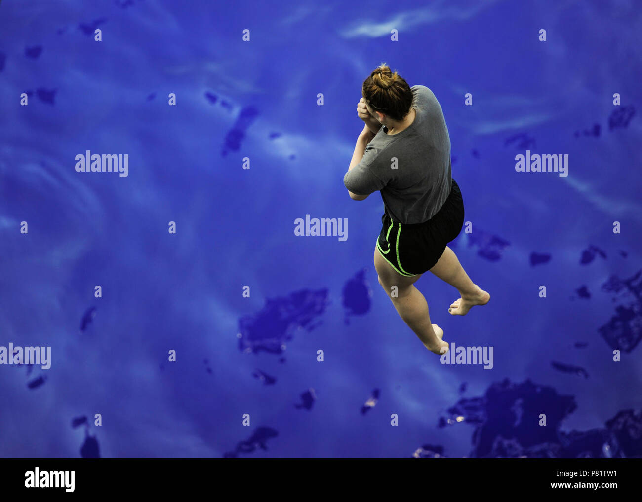 OCEAN (Aug. 27, 2016) A Sailor jumps from an aircraft elevator on the ...