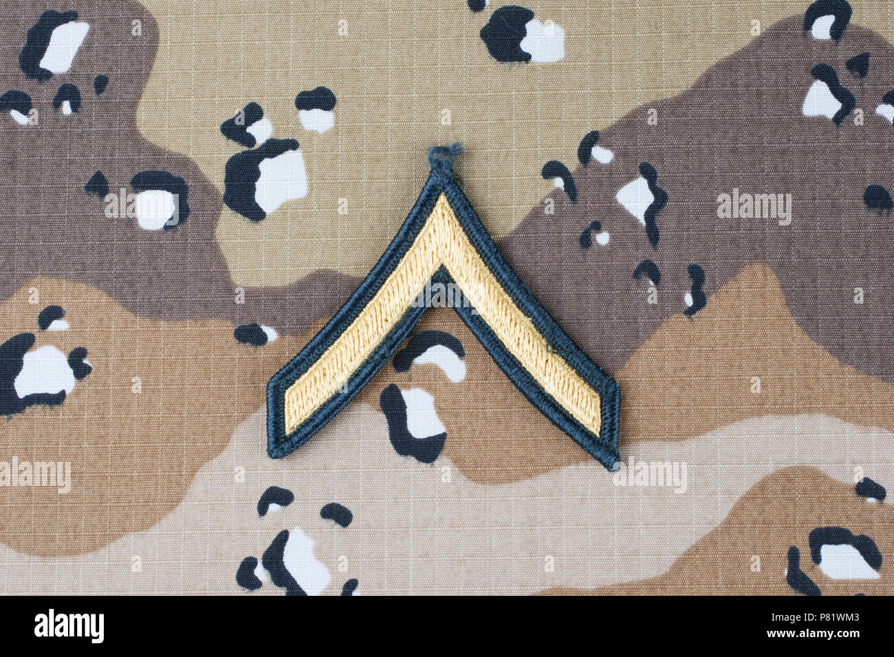 May 12, 2018. US ARMY Private rank patch on desert camouflage uniform ...