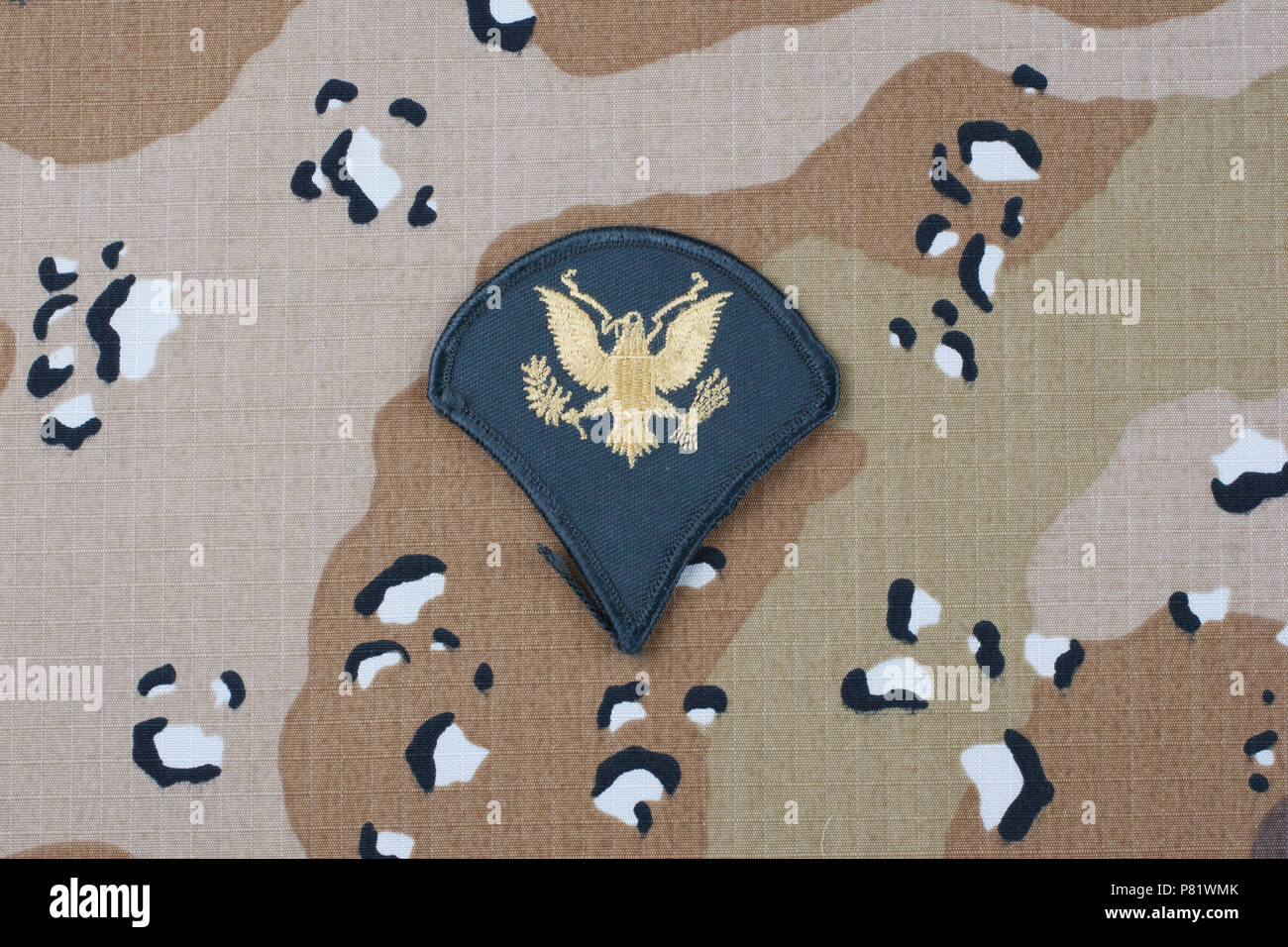 May 12, 2018. US ARMY Specialist rank patch on desert camouflage ...