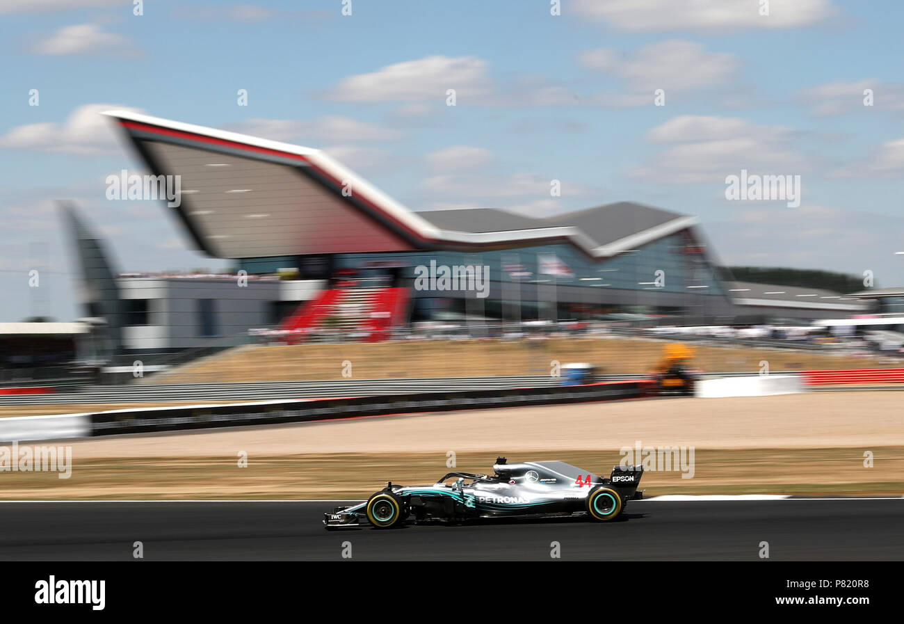 Mercedes' Lewis Hamilton drives past the grandstand during the 2018 ...