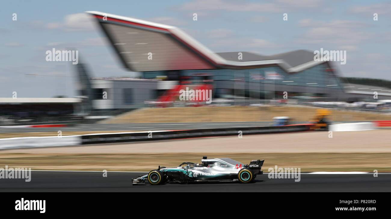 Mercedes' Lewis Hamilton drives past the grandstand during the 2018 ...