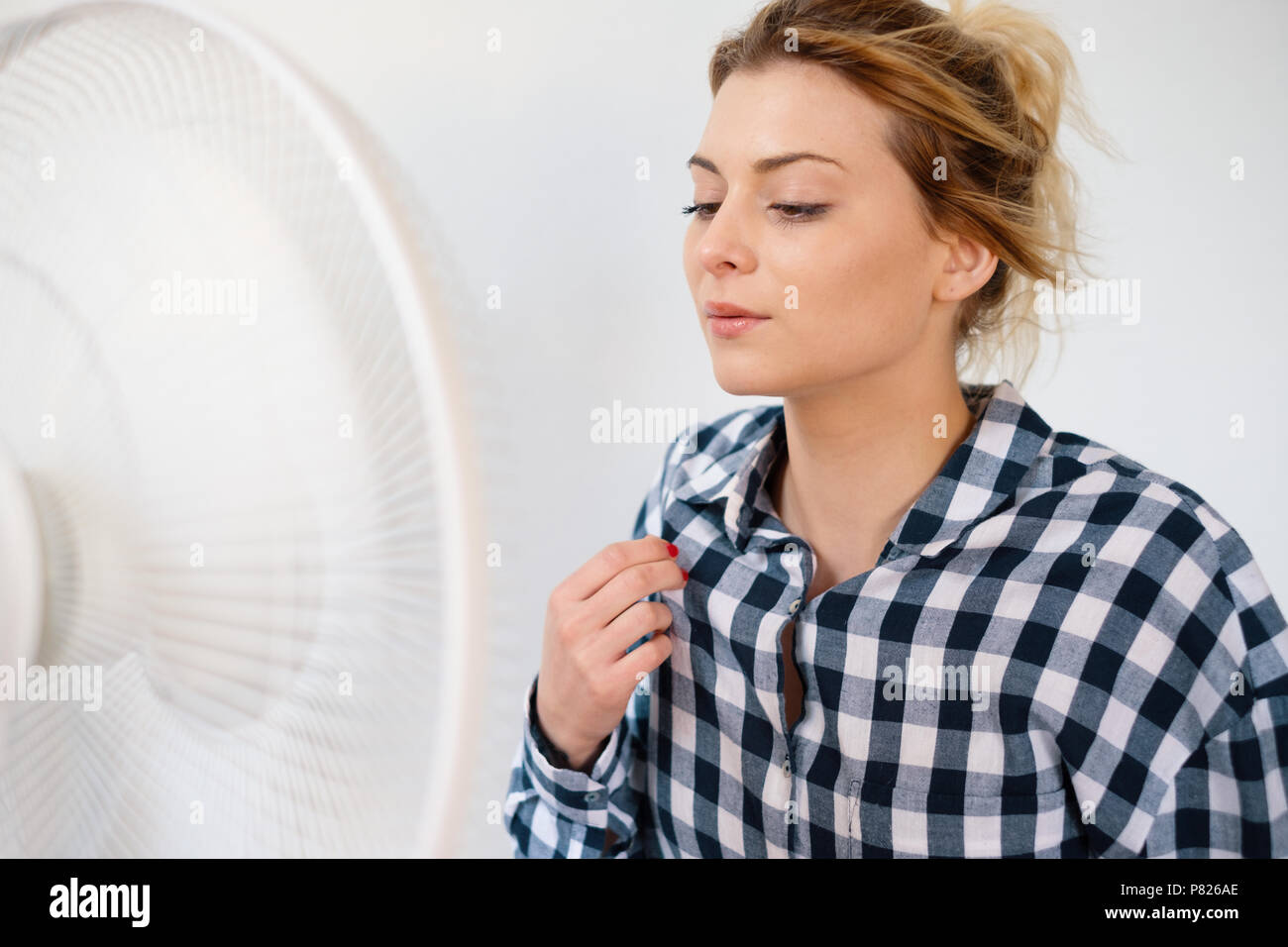 Fan in front of face hi-res stock photography and images - Alamy