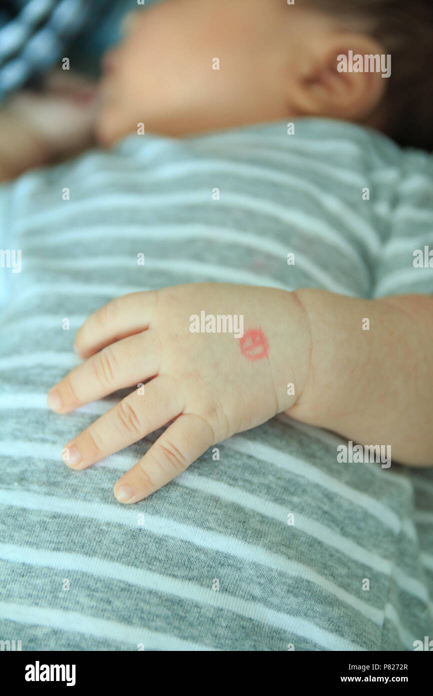 Korean voting stamp on the hand of baby Stock Photo - Alamy