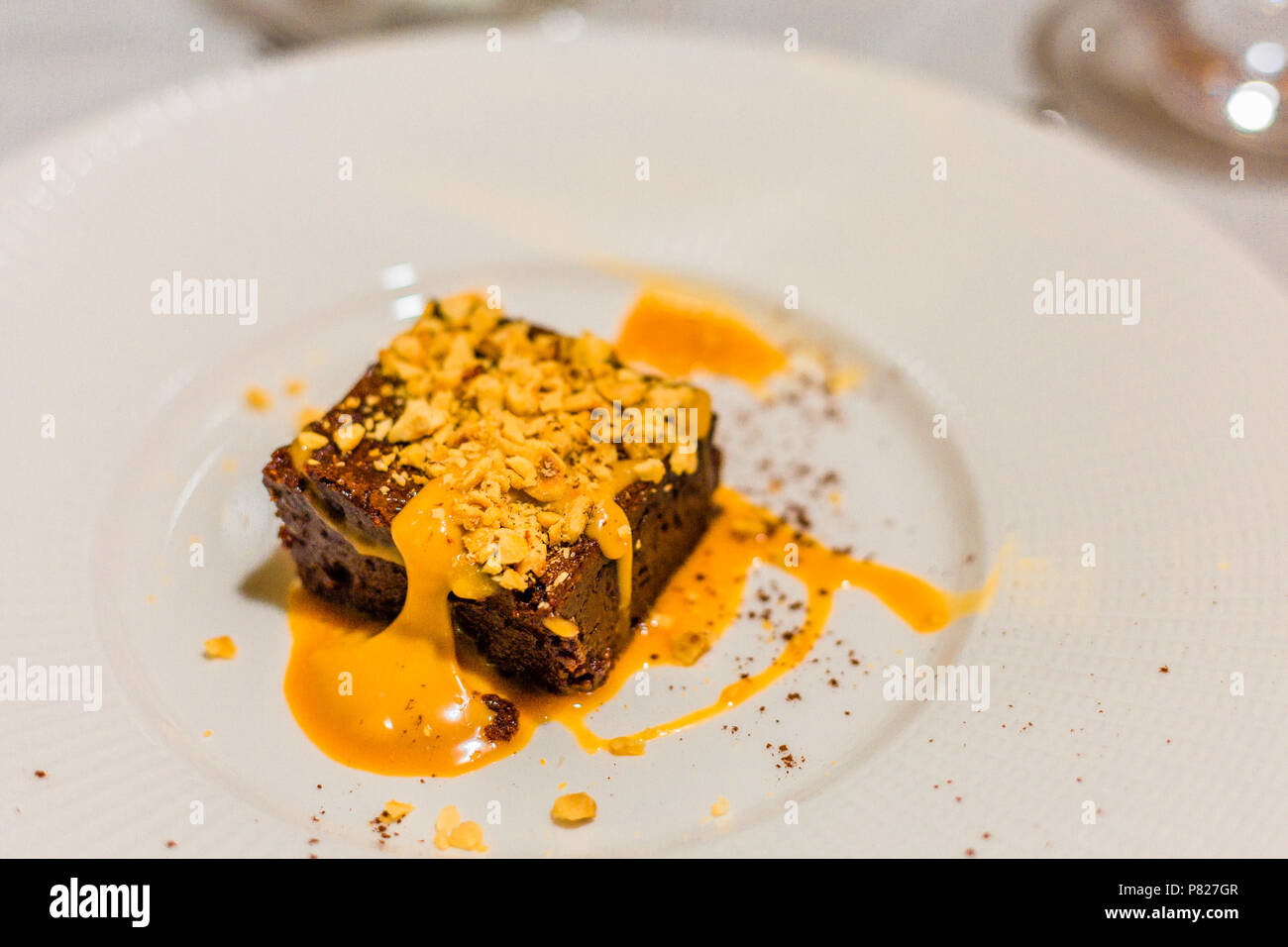 Serving of dessert at the restaurant, chocolate tile Stock Photo - Alamy