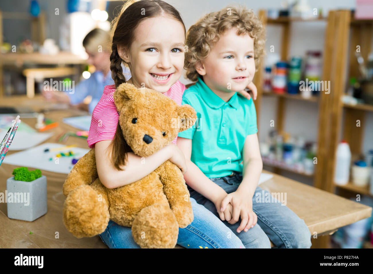 Cute Little Kids with Teddy Bear Stock Photo - Alamy