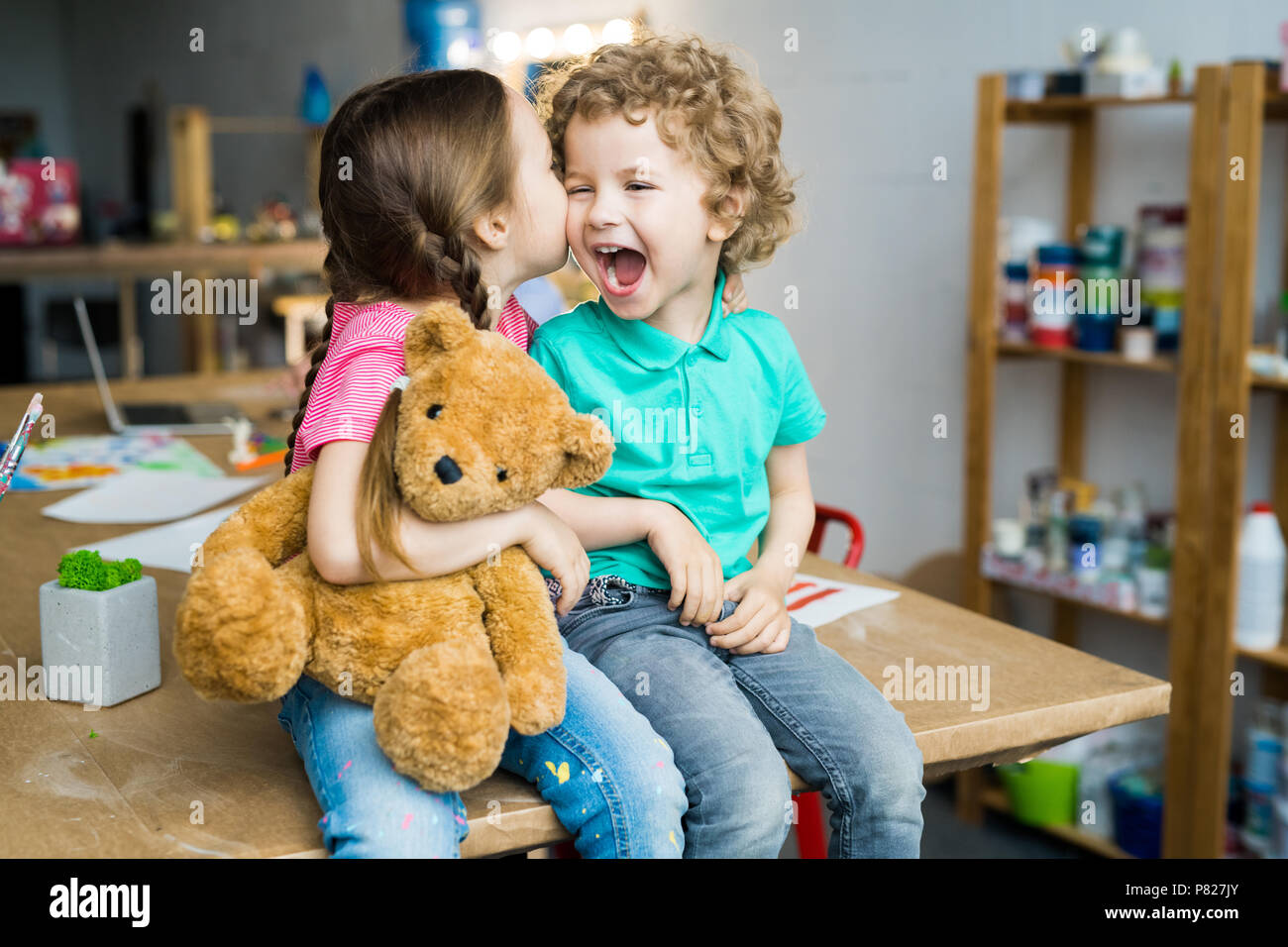 Sister kissing brother hi-res stock photography and images - Alamy