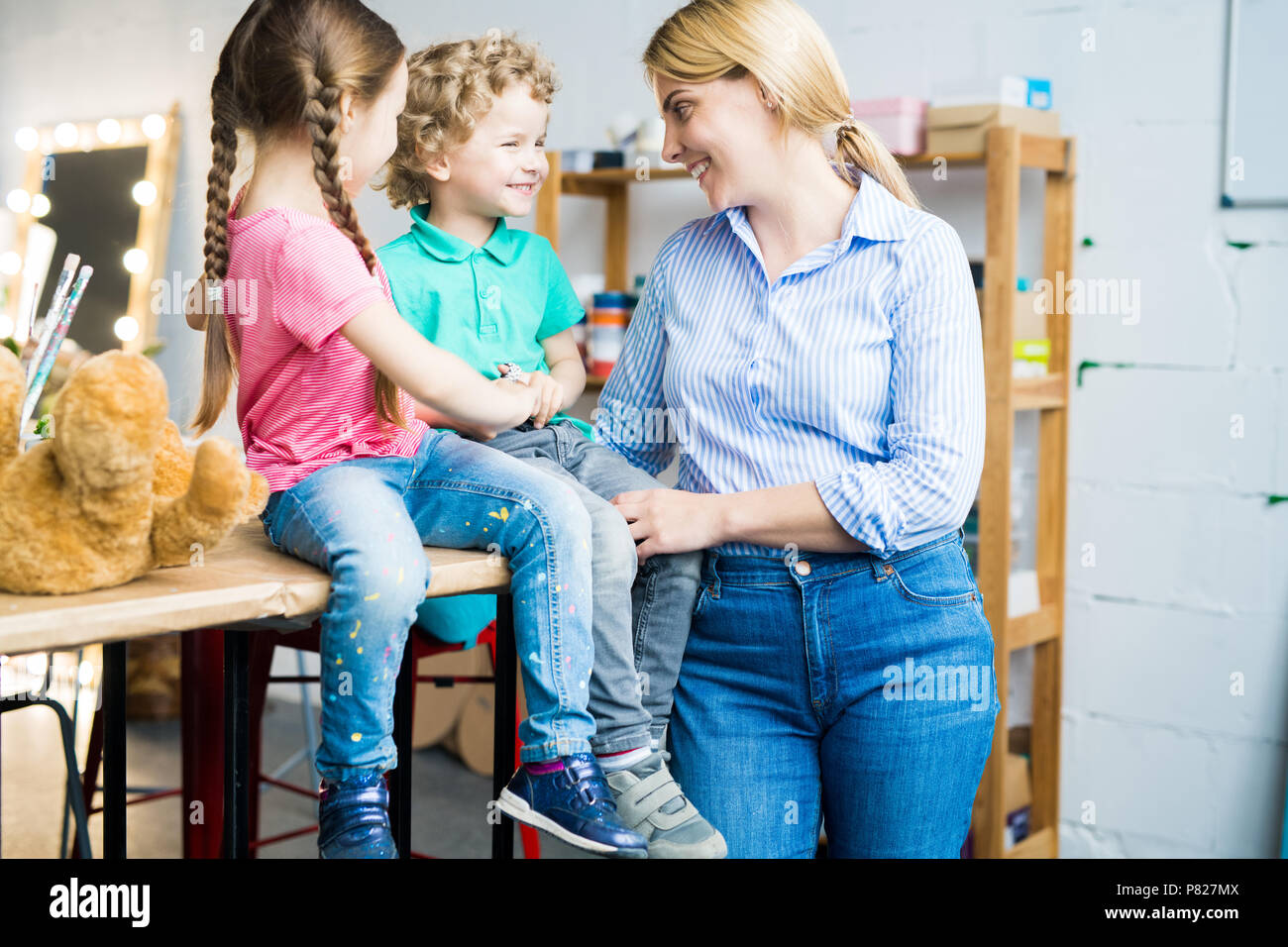 Modern Mom with Two Cute Kids Stock Photo - Alamy