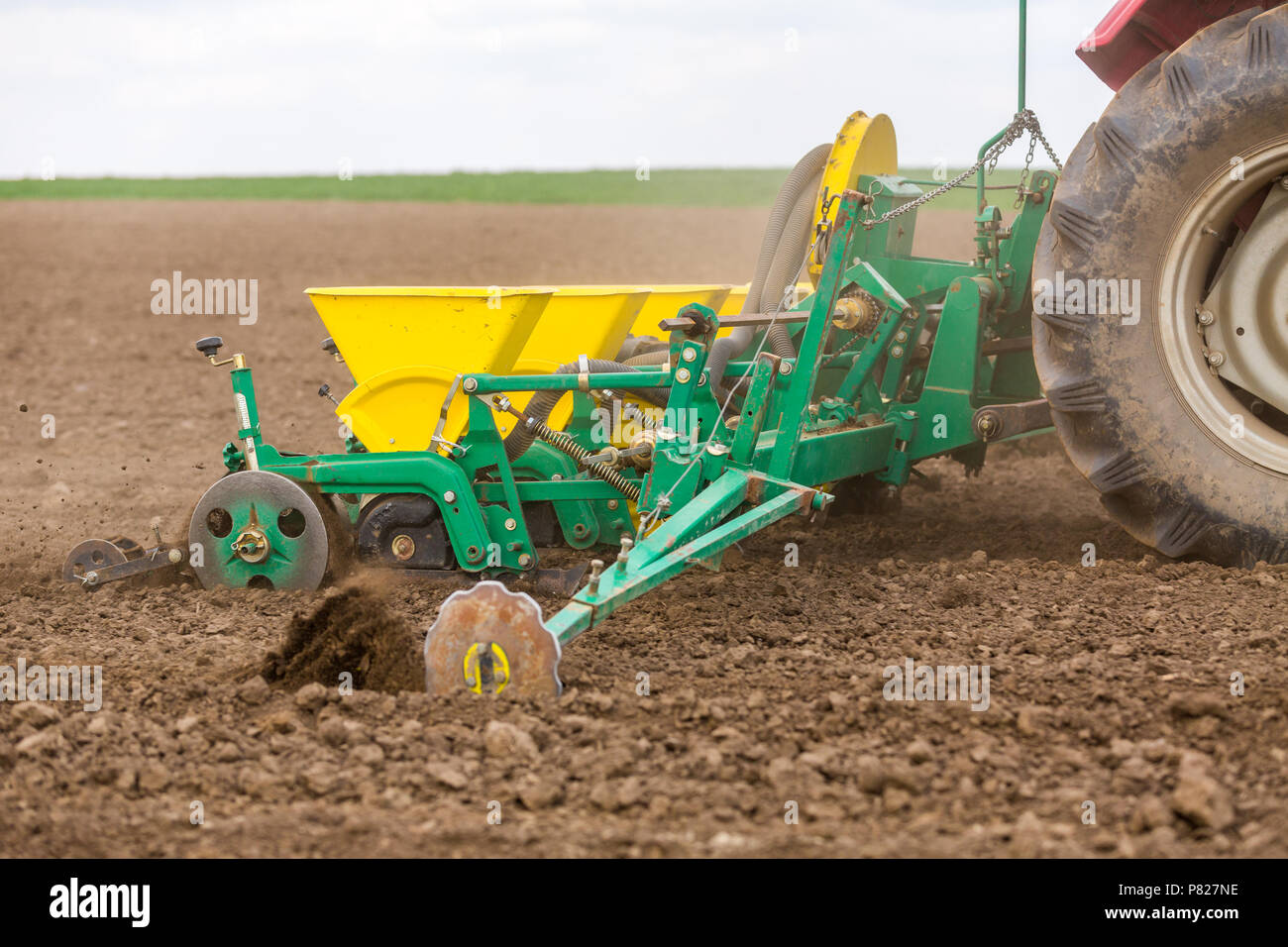 Farmer seeding, sowing crops at field. Sowing is the process of ...