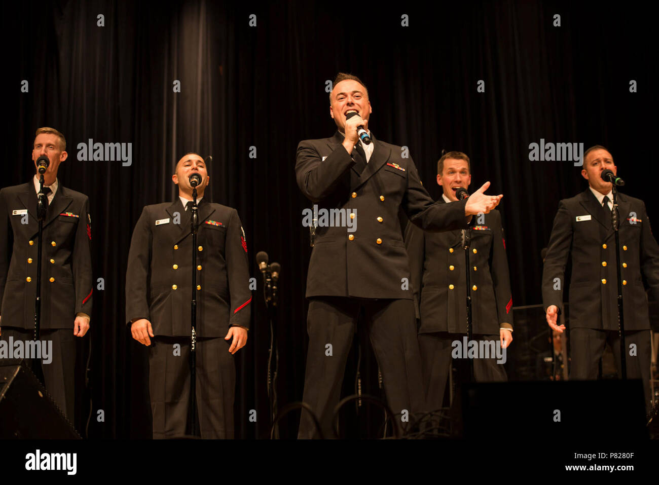 EDINBORO, PA (April 5, 2016) Musician 1st Class Michael Webb sings with ...