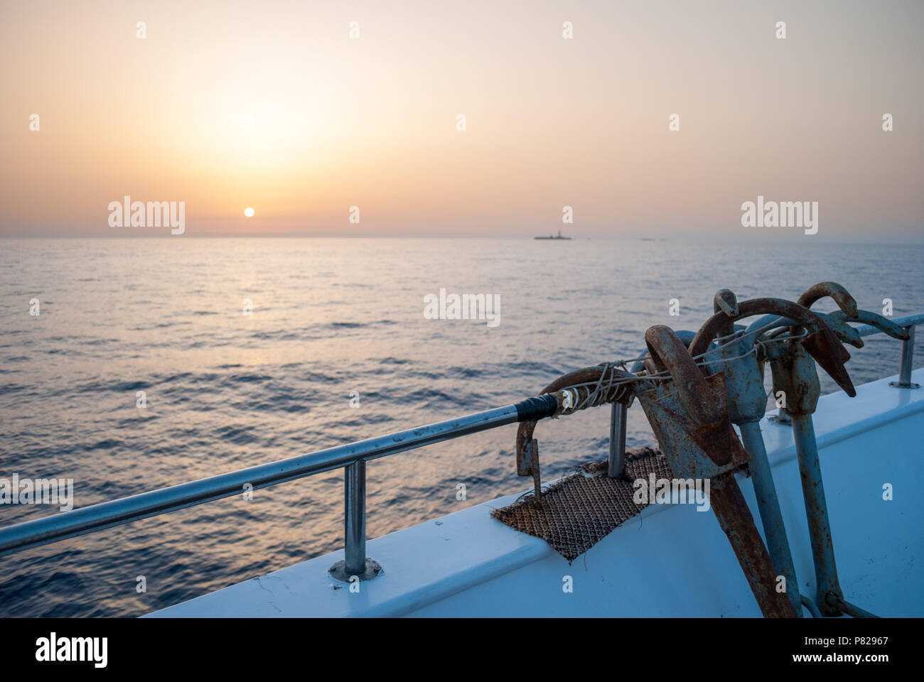 deck of a diving ship with achors on the forground, sunset, Red Sea ...