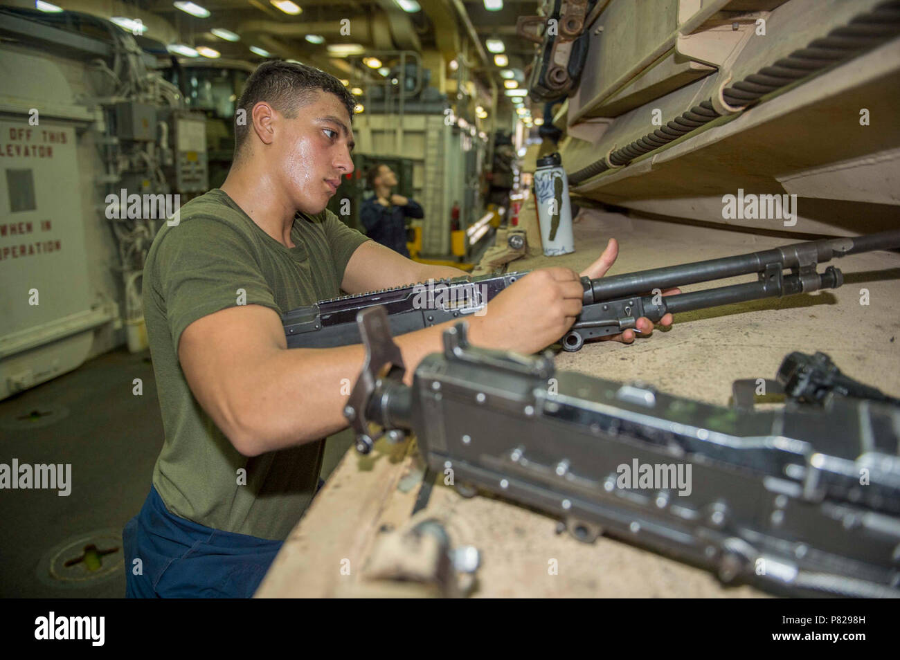 GULF OF ADEN (April 18, 2016) Lance Cpl. Paul Ferreti performs ...