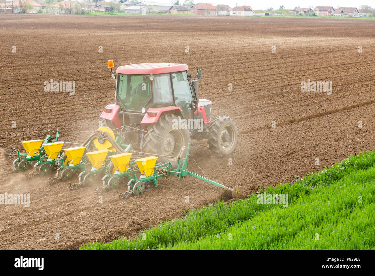 Farmer seeding, sowing crops at field. Sowing is the process of ...