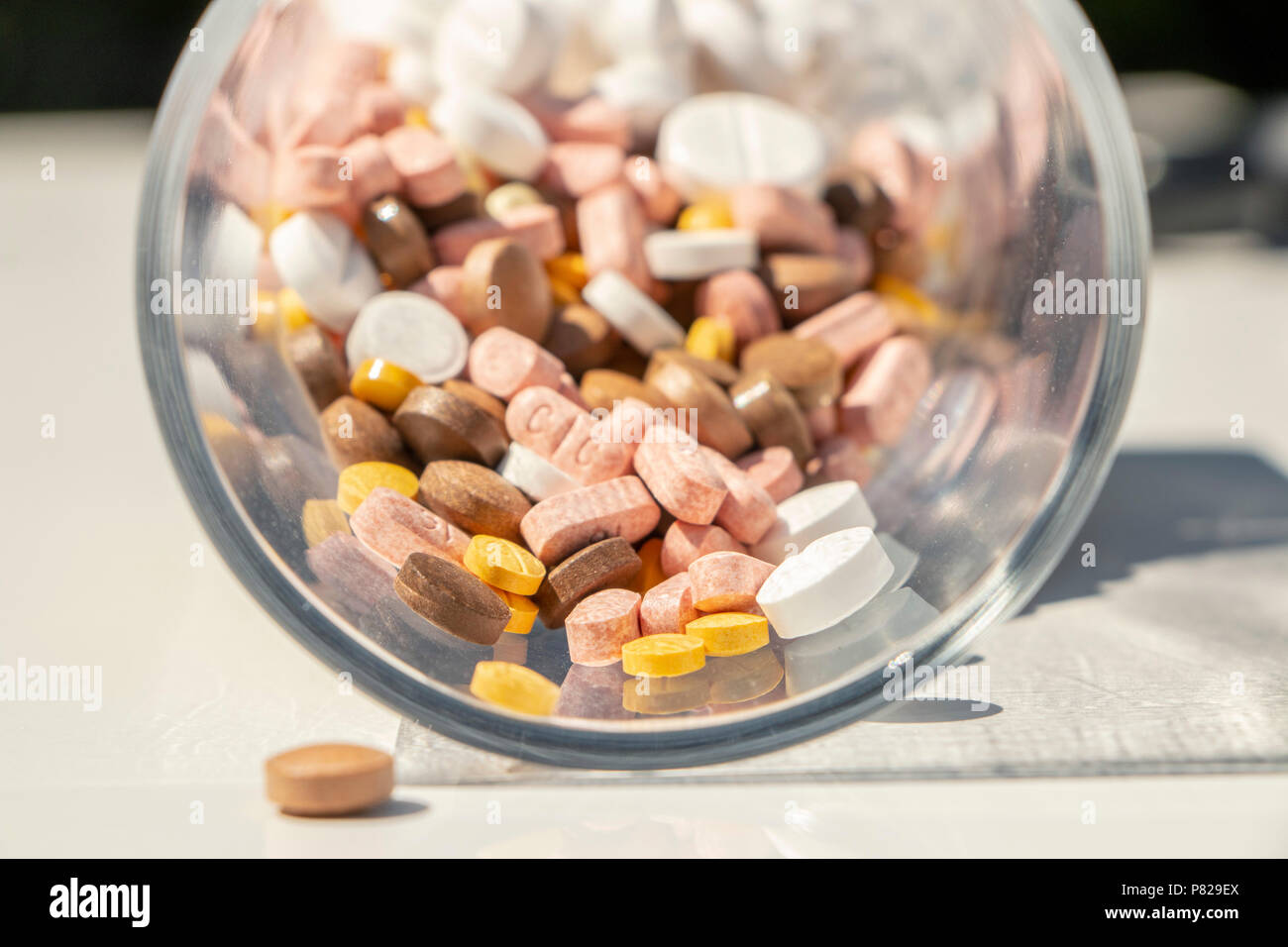 Coloured tablets bottle hi-res stock photography and images - Alamy
