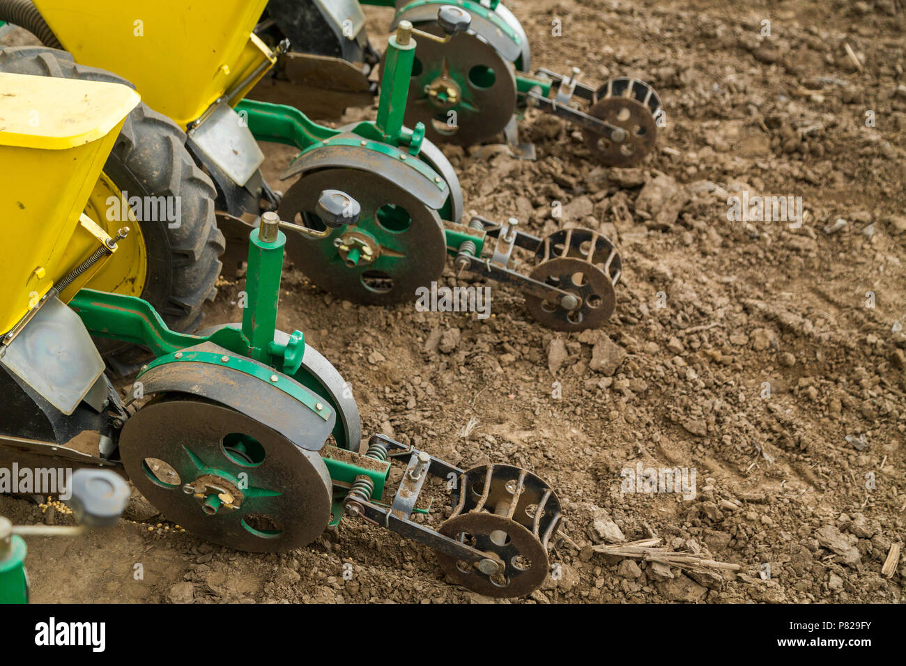 Farmer seeding, sowing crops at field. Sowing is the process of ...